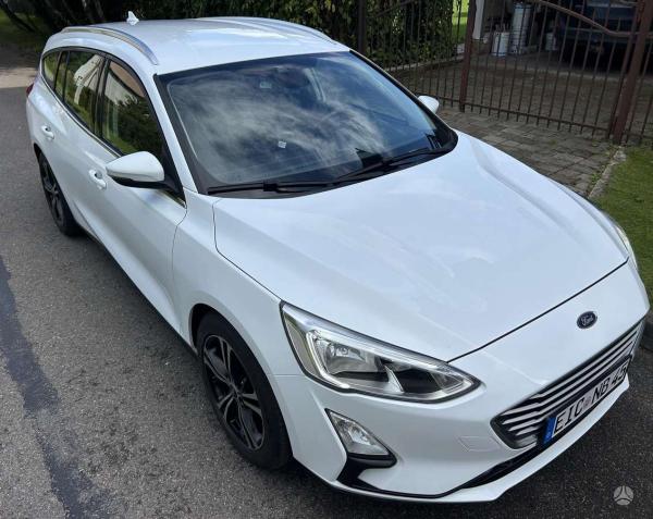 White Ford Focus 2018 in Vilnius, with an engine capacity of 1.50 L and mileage of 217 thousand km for 6600 €, photo 11 on AUTOMOTO.COM.LV