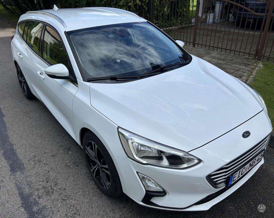 White Ford Focus 2018 in Vilnius, with an engine capacity of 1.50 L and mileage of 217 thousand km for 6600 €, photo 11 on AUTOMOTO.COM.LV