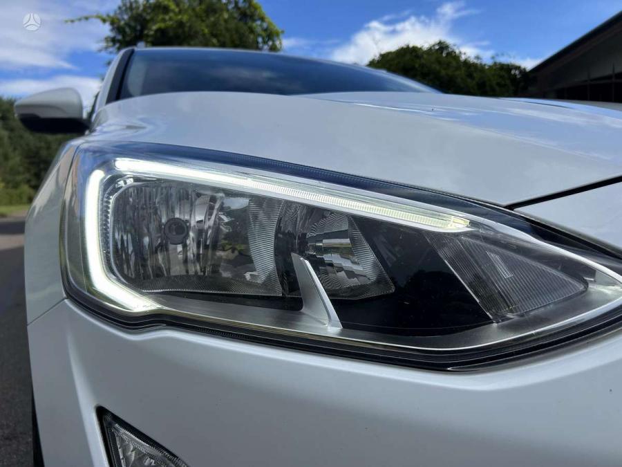 White Ford Focus 2018 in Vilnius, with an engine capacity of 1.50 L and mileage of 217 thousand km for 6600 €, photo 13 on AUTOMOTO.COM.LV