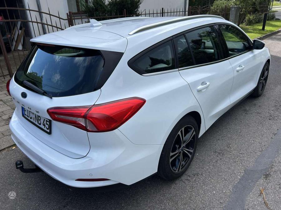 White Ford Focus 2018 in Vilnius, with an engine capacity of 1.50 L and mileage of 217 thousand km for 6600 €, photo 14 on AUTOMOTO.COM.LV