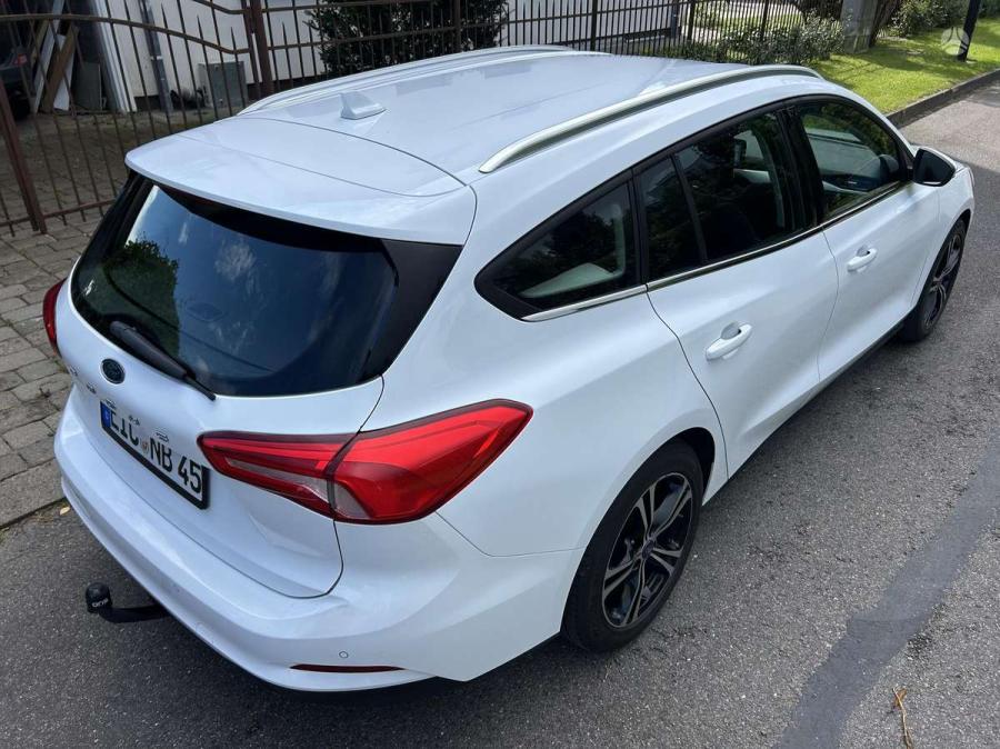 White Ford Focus 2018 in Vilnius, with an engine capacity of 1.50 L and mileage of 217 thousand km for 6600 €, photo 16 on AUTOMOTO.COM.LV