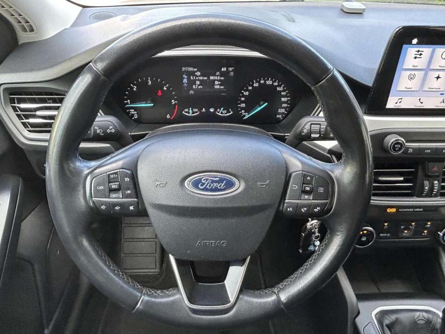 White Ford Focus 2018 in Vilnius, with an engine capacity of 1.50 L and mileage of 217 thousand km for 6600 €, photo 21 on AUTOMOTO.COM.LV