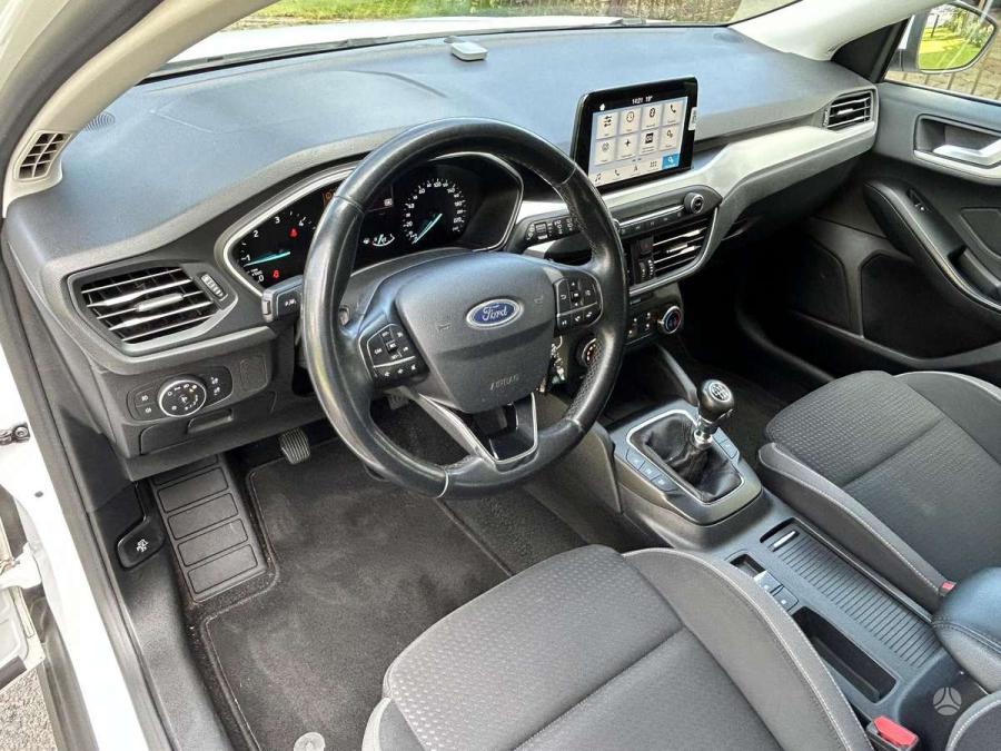 White Ford Focus 2018 in Vilnius, with an engine capacity of 1.50 L and mileage of 217 thousand km for 6600 €, photo 22 on AUTOMOTO.COM.LV