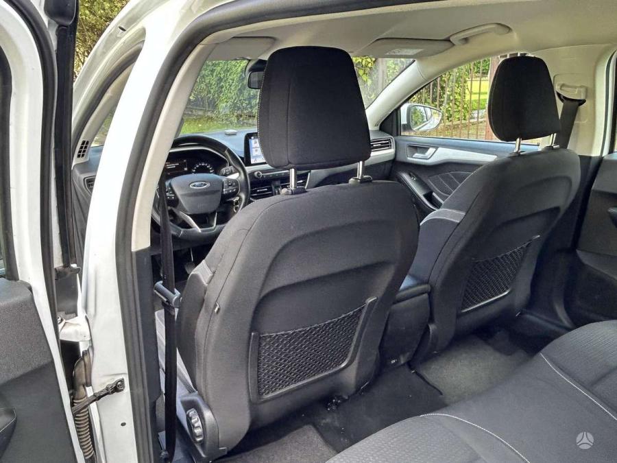 White Ford Focus 2018 in Vilnius, with an engine capacity of 1.50 L and mileage of 217 thousand km for 6600 €, photo 34 on AUTOMOTO.COM.LV