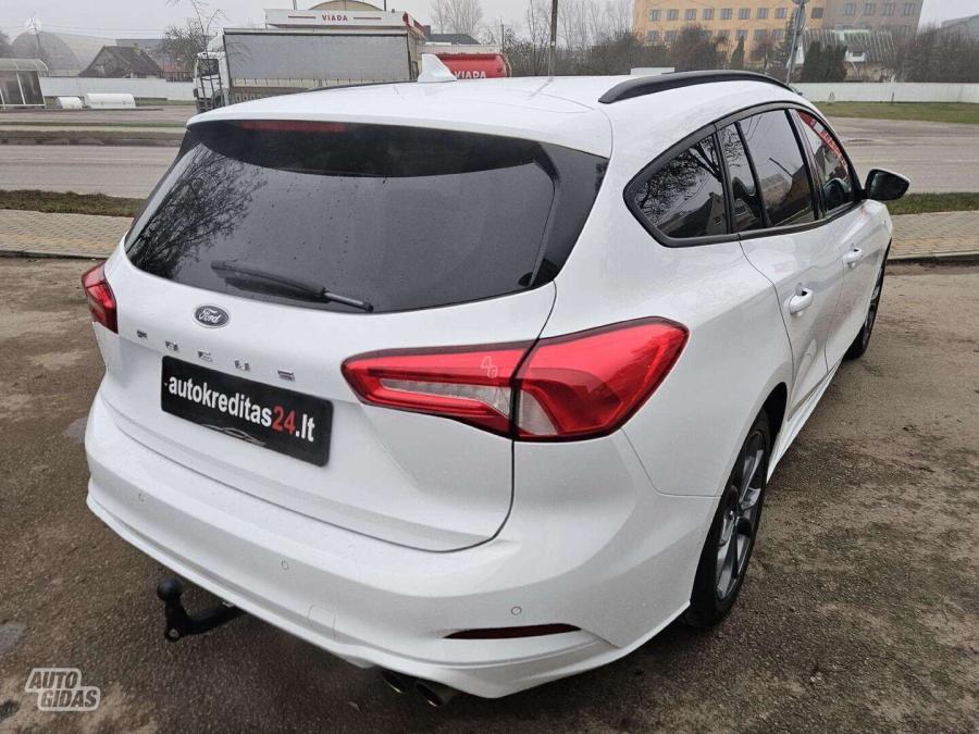 White Ford Focus 2019 in Siauliai, with an engine capacity of 1.00 L and mileage of 186 thousand km for 8450 €, photo 4 on AUTOMOTO.COM.LV