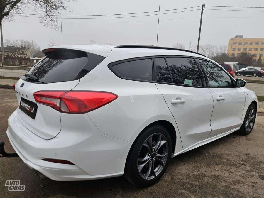 White Ford Focus 2019 in Siauliai, with an engine capacity of 1.00 L and mileage of 186 thousand km for 8450 €, photo 5 on AUTOMOTO.COM.LV