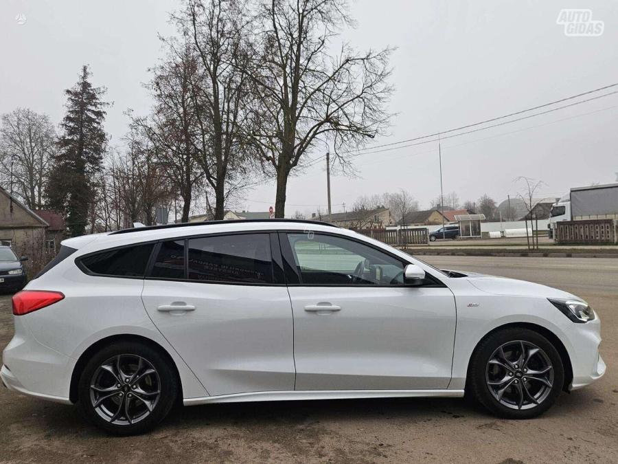 White Ford Focus 2019 in Siauliai, with an engine capacity of 1.00 L and mileage of 186 thousand km for 8450 €, photo 6 on AUTOMOTO.COM.LV