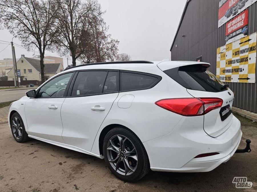 White Ford Focus 2019 in Siauliai, with an engine capacity of 1.00 L and mileage of 186 thousand km for 8450 €, photo 8 on AUTOMOTO.COM.LV