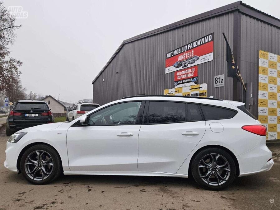 White Ford Focus 2019 in Siauliai, with an engine capacity of 1.00 L and mileage of 186 thousand km for 8450 €, photo 9 on AUTOMOTO.COM.LV