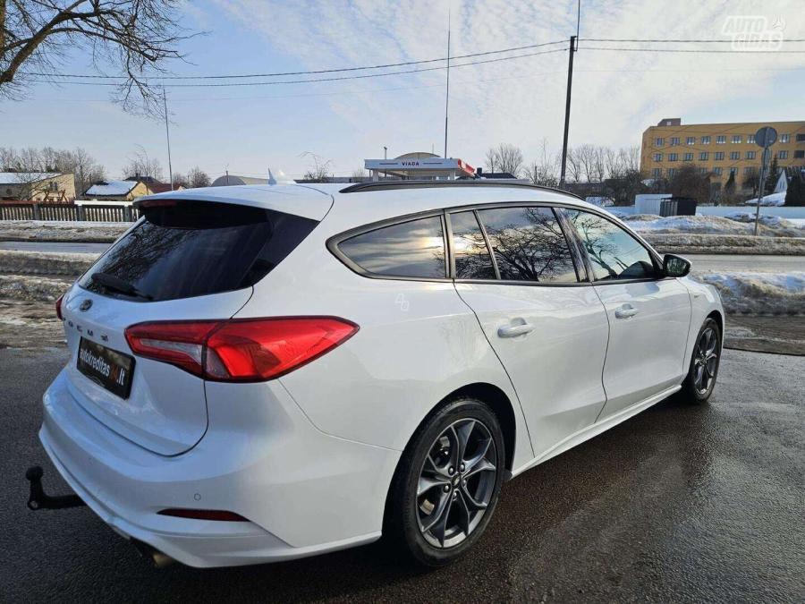 White Ford Focus 2019 in Siauliai, with an engine capacity of 1.00 L and mileage of 186 thousand km for 8550 €, photo 5 on AUTOMOTO.COM.LV