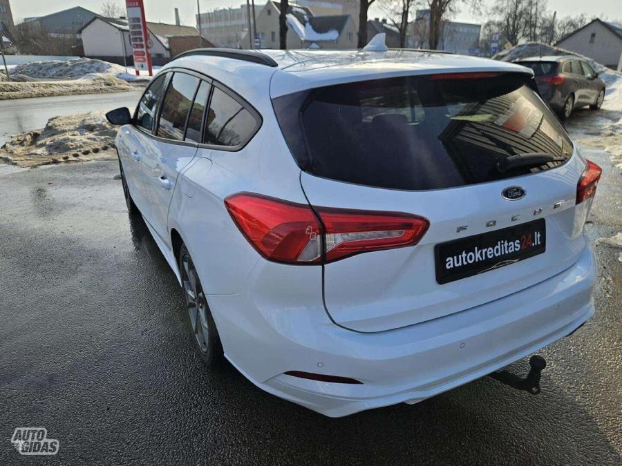 White Ford Focus 2019 in Siauliai, with an engine capacity of 1.00 L and mileage of 186 thousand km for 8550 €, photo 7 on AUTOMOTO.COM.LV