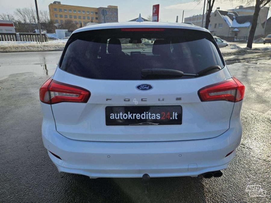 White Ford Focus 2019 in Siauliai, with an engine capacity of 1.00 L and mileage of 186 thousand km for 8550 €, photo 9 on AUTOMOTO.COM.LV