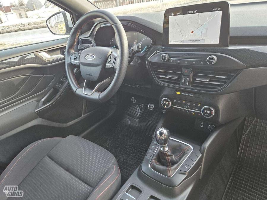 White Ford Focus 2019 in Siauliai, with an engine capacity of 1.00 L and mileage of 186 thousand km for 8550 €, photo 13 on AUTOMOTO.COM.LV