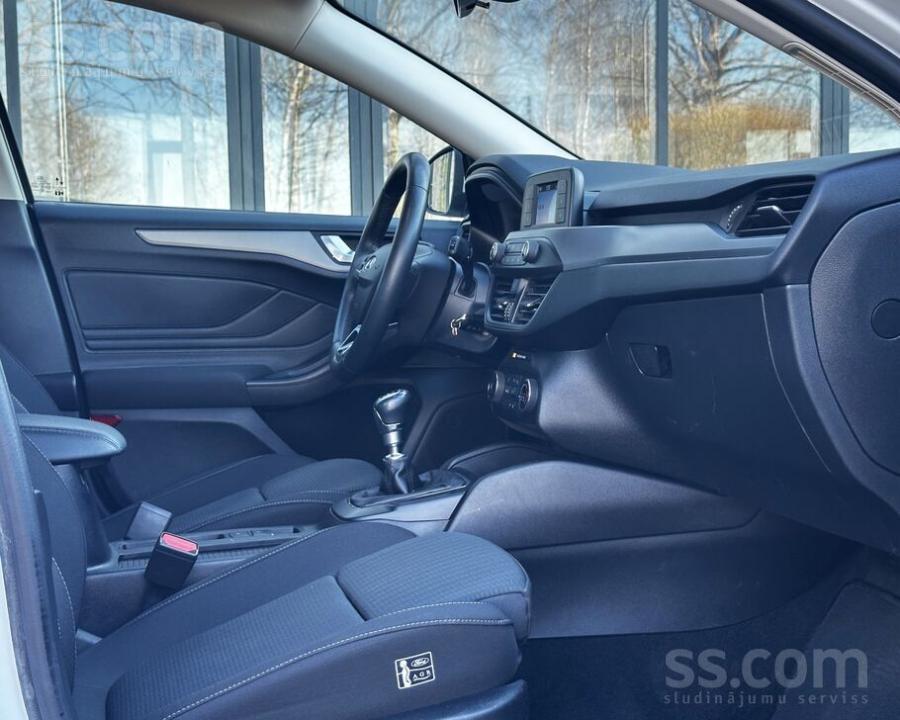 White Ford Focus 2019 in Tukums, with an engine capacity of 1.50 L and mileage of 150 thousand km for 8850 €, photo 13 on AUTOMOTO.COM.LV