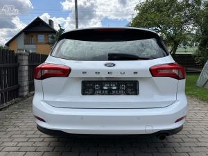 White Ford Focus 2019 in Prienai, with an engine capacity of 1.00 L and mileage of 142 thousand km for 7100 €, photo 6 on AUTOMOTO.COM.LV