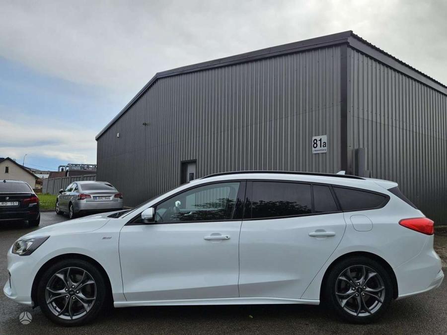 White Ford Focus 2019 in Siauliai, with an engine capacity of 1.00 L and mileage of 186 thousand km for 7400 €, photo 11 on AUTOMOTO.COM.LV