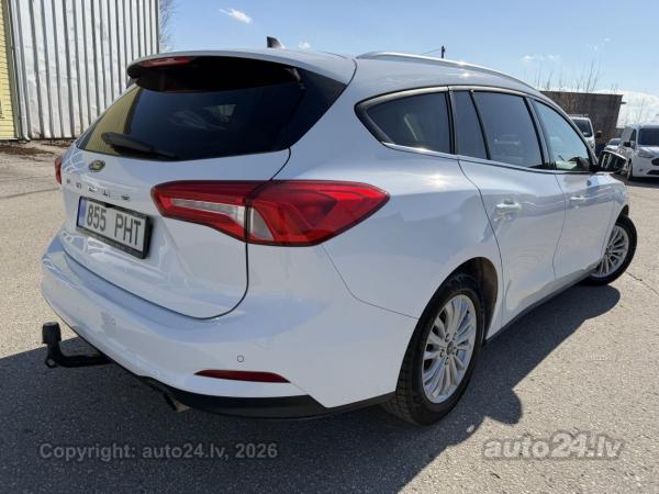 White Ford Focus 2021 in Tartu, with an engine capacity of 1.50 L and mileage of 196 thousand km for 10999 €, photo 4 on AUTOMOTO.COM.LV