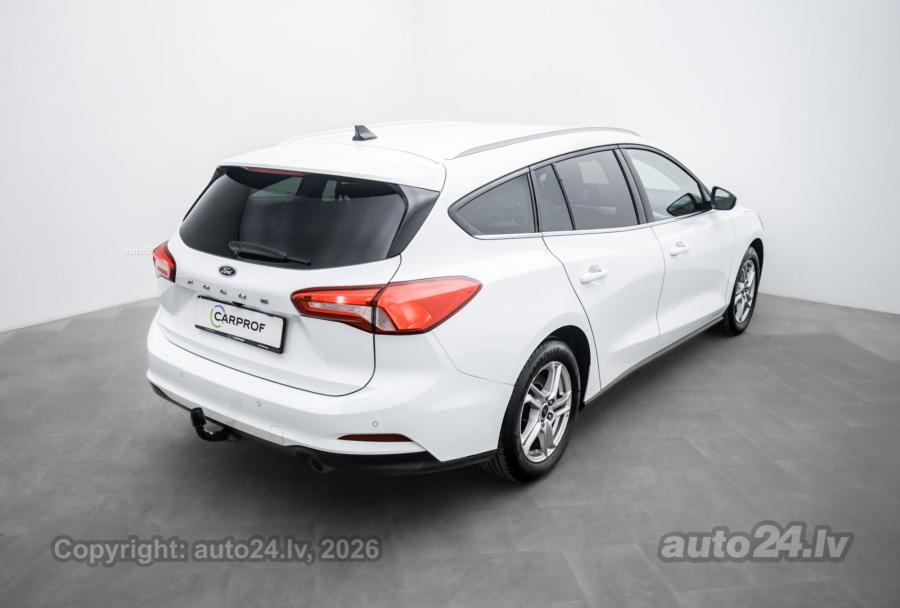 White Ford Focus 2022 in Tallinn, with an engine capacity of 1.00 L and mileage of 145 thousand km for 11999 €, photo 5 on AUTOMOTO.COM.LV