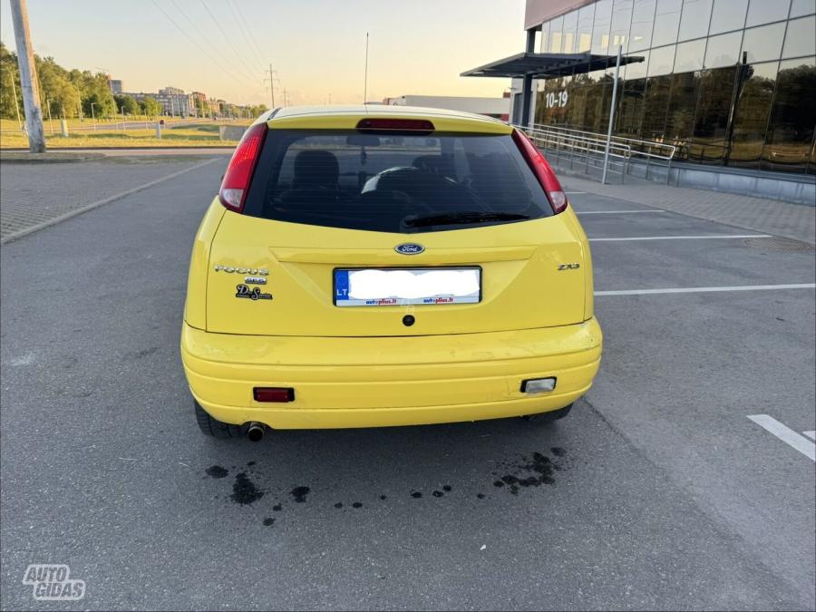 Yellow Ford Focus 2005 in Siauliai, with an engine capacity of 2.00 L and mileage of 150 thousand km for 550 €, photo 6 on AUTOMOTO.COM.LV