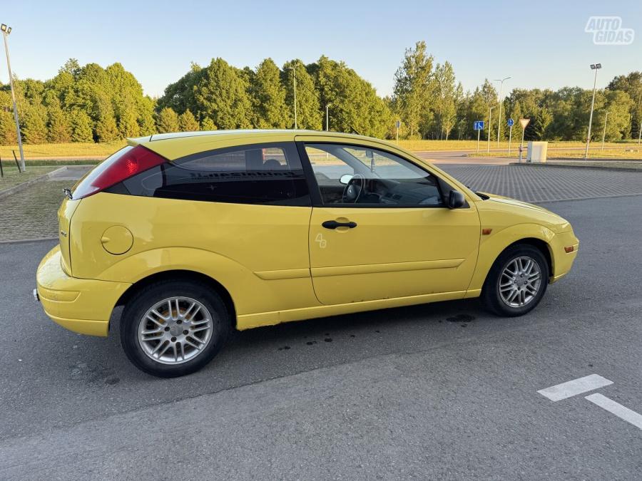 Yellow Ford Focus 2005 in Siauliai, with an engine capacity of 2.00 L and mileage of 150 thousand km for 550 €, photo 8 on AUTOMOTO.COM.LV