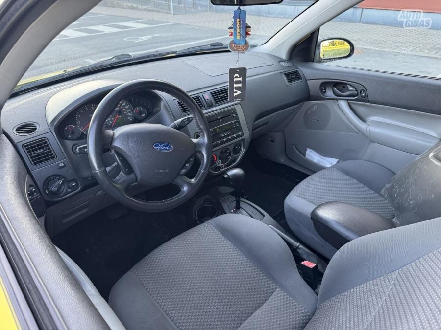 Yellow Ford Focus 2005 in Siauliai, with an engine capacity of 2.00 L and mileage of 150 thousand km for 550 €, photo 12 on AUTOMOTO.COM.LV