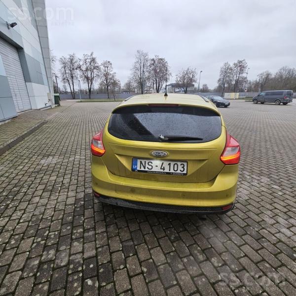 Yellow Ford Focus 2011 in Dobele, with an engine capacity of 1.60 L and mileage of 300 thousand km for 1700 €, photo 4 on AUTOMOTO.COM.LV