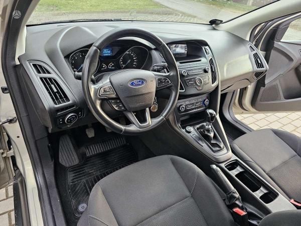 Yellow Ford Focus 2015 in Kaunas, with an engine capacity of 1.00 L and mileage of 129 thousand km for 4999 €, photo 9 on AUTOMOTO.COM.LV