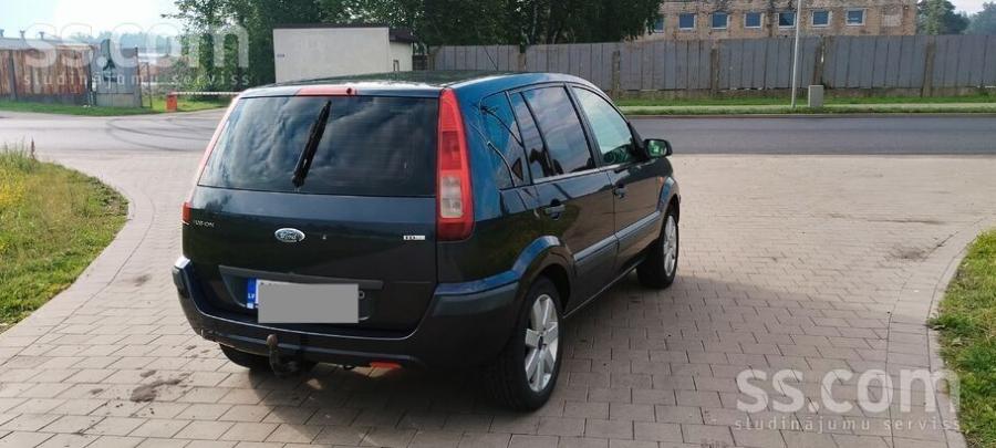 Black Ford Fusion 2006 in Riga, with an engine capacity of 1.60 L and mileage of 319 thousand km for 2000 €, photo 4 on AUTOMOTO.COM.LV