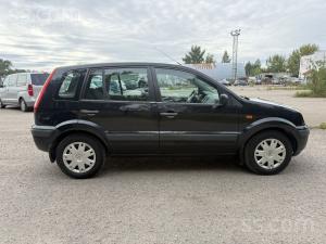 Black Ford Fusion 2006 in Riga, with an engine capacity of 1.40 L and mileage of 262 thousand km for 1180 €, photo 7 on AUTOMOTO.COM.LV