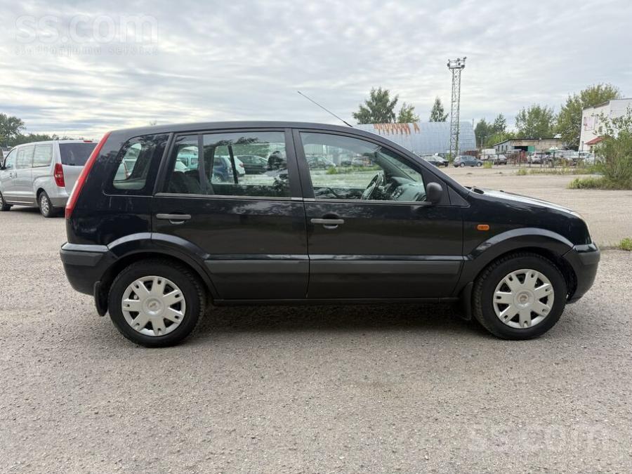 Black Ford Fusion 2006 in Riga, with an engine capacity of 1.40 L and mileage of 262 thousand km for 1180 €, photo 7 on AUTOMOTO.COM.LV