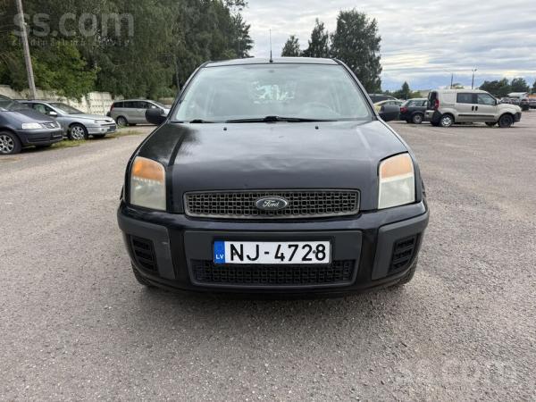 Black Ford Fusion 2006 in Riga, with an engine capacity of 1.40 L and mileage of 262 thousand km for 1180 €, photo 7 on AUTOMOTO.COM.LV