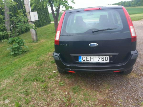 Black Ford Fusion 2007 in Kedainiai, with an engine capacity of 1.39 L and mileage of 300 thousand km for 2000 €, photo 3 on AUTOMOTO.COM.LV