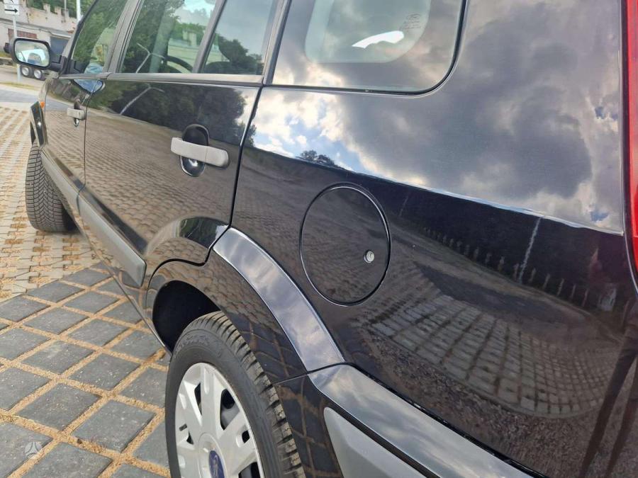 Black Ford Fusion 2008 in Prienai, with an engine capacity of 1.39 L and mileage of 108 thousand km for 2699 €, photo 6 on AUTOMOTO.COM.LV