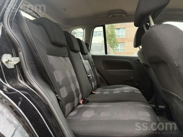 Black Ford Fusion 2011 in Riga, with an engine capacity of 1.40 L and mileage of 0 thousand km for 3600 €, photo 8 on AUTOMOTO.COM.LV