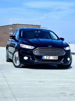 Black Ford Fusion 2013 in Vilnius, with an engine capacity of 2.00 L and mileage of 248 thousand km for 7599 €, photo 2 on AUTOMOTO.COM.LV