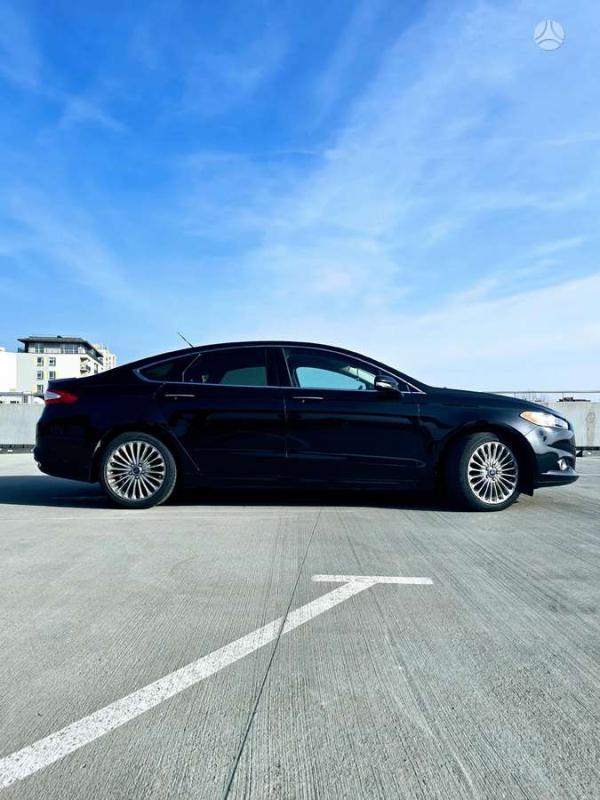 Melns Ford Fusion 2013 Viļņa, ar dzinēja tilpumu 2.00 L un nobraukumu 248 tūkst. km par 7599 €, foto 3 vietnē AUTOMOTO.COM.LV