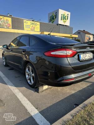 Black Ford Fusion 2013 in Vilnius, with an engine capacity of 1.60 L and mileage of 204 thousand km for 4600 €, photo 4 on AUTOMOTO.COM.LV