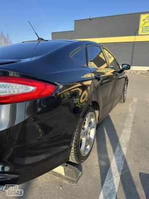 Black Ford Fusion 2013 in Vilnius, with an engine capacity of 1.60 L and mileage of 204 thousand km for 4600 €, photo 5 on AUTOMOTO.COM.LV
