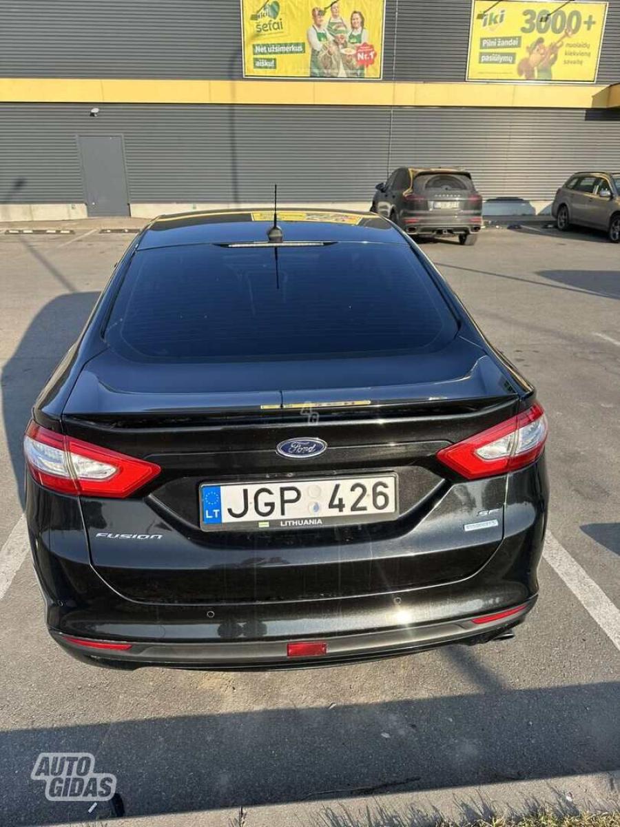 Black Ford Fusion 2013 in Vilnius, with an engine capacity of 1.60 L and mileage of 204 thousand km for 4600 €, photo 6 on AUTOMOTO.COM.LV