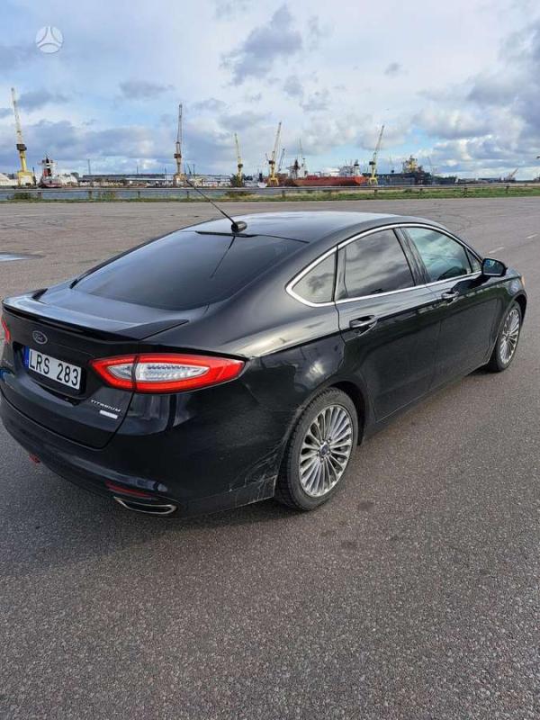 Black Ford Fusion 2015 in Klaipeda, with an engine capacity of 2.00 L and mileage of 195 thousand km for 6300 €, photo 1 on AUTOMOTO.COM.LV