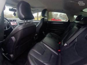 Black Ford Fusion 2016 in Kelme, with an engine capacity of 2.00 L and mileage of 145 thousand km for 9500 €, photo 14 on AUTOMOTO.COM.LV