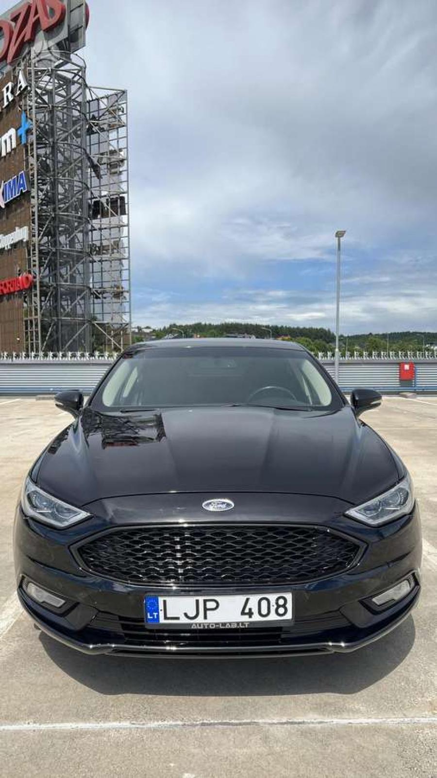 Black Ford Fusion 2017 in Vilnius, with an engine capacity of 2.00 L and mileage of 139 thousand km for 10500 €, photo 4 on AUTOMOTO.COM.LV