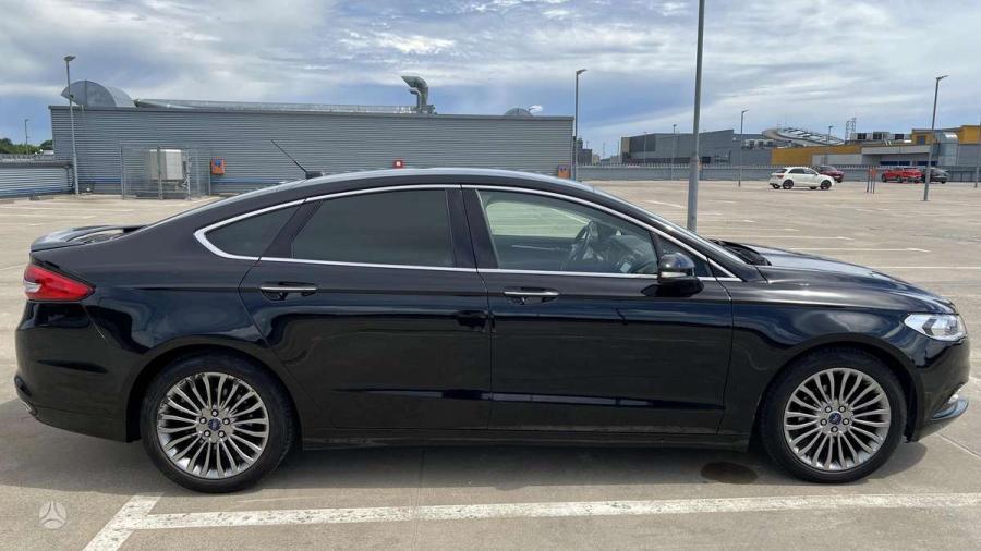 Black Ford Fusion 2017 in Vilnius, with an engine capacity of 2.00 L and mileage of 139 thousand km for 10500 €, photo 5 on AUTOMOTO.COM.LV