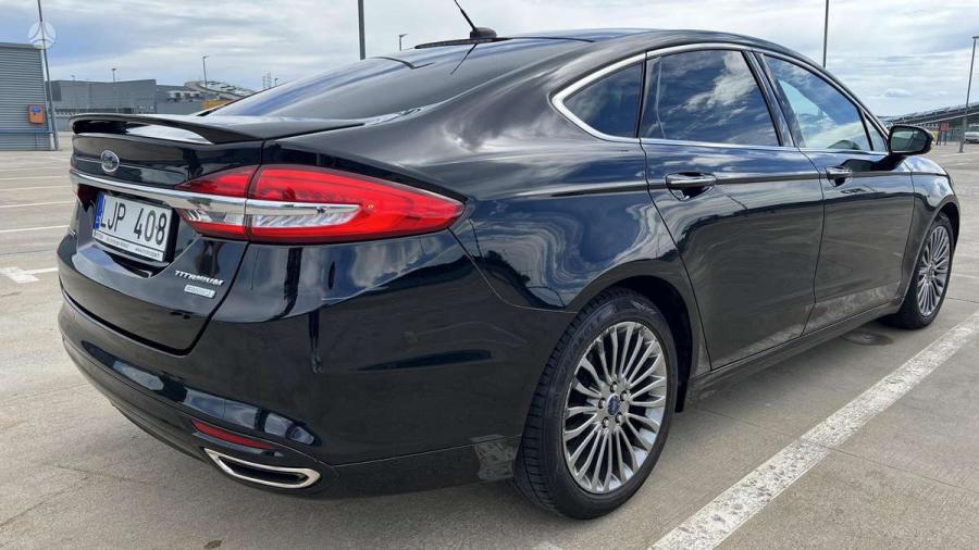 Black Ford Fusion 2017 in Vilnius, with an engine capacity of 2.00 L and mileage of 139 thousand km for 10500 €, photo 6 on AUTOMOTO.COM.LV