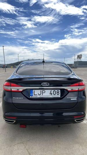 Black Ford Fusion 2017 in Vilnius, with an engine capacity of 2.00 L and mileage of 139 thousand km for 10500 €, photo 7 on AUTOMOTO.COM.LV