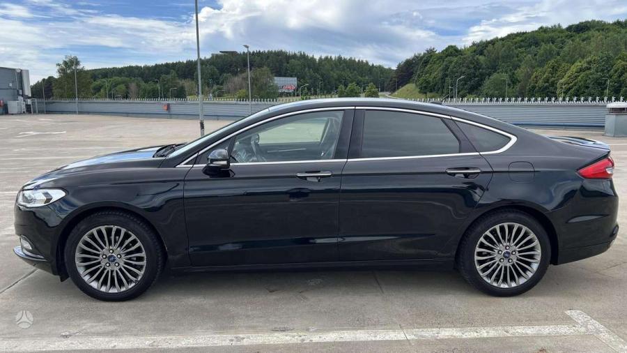 Black Ford Fusion 2017 in Vilnius, with an engine capacity of 2.00 L and mileage of 139 thousand km for 10500 €, photo 8 on AUTOMOTO.COM.LV