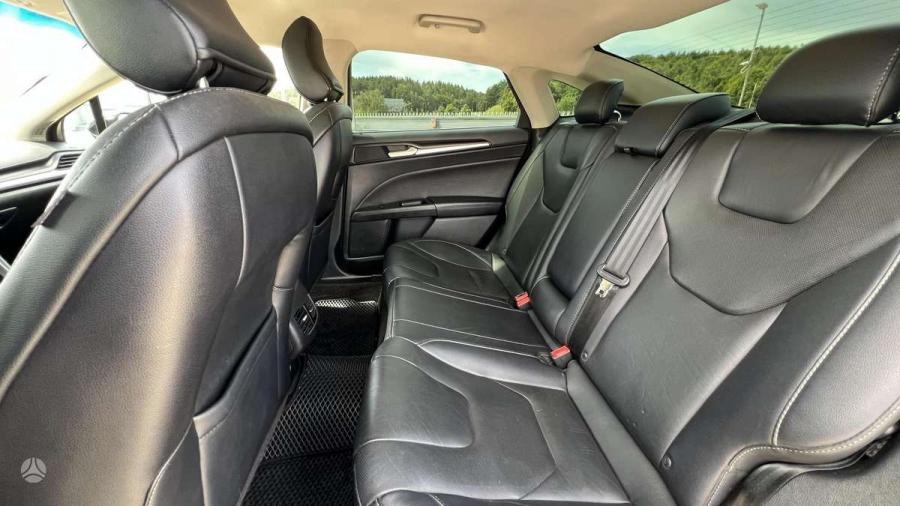 Black Ford Fusion 2017 in Vilnius, with an engine capacity of 2.00 L and mileage of 139 thousand km for 10500 €, photo 12 on AUTOMOTO.COM.LV