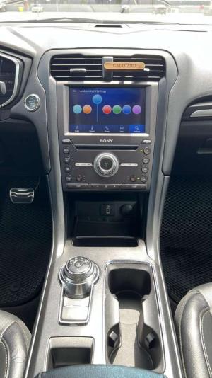 Black Ford Fusion 2017 in Vilnius, with an engine capacity of 2.00 L and mileage of 139 thousand km for 10500 €, photo 17 on AUTOMOTO.COM.LV