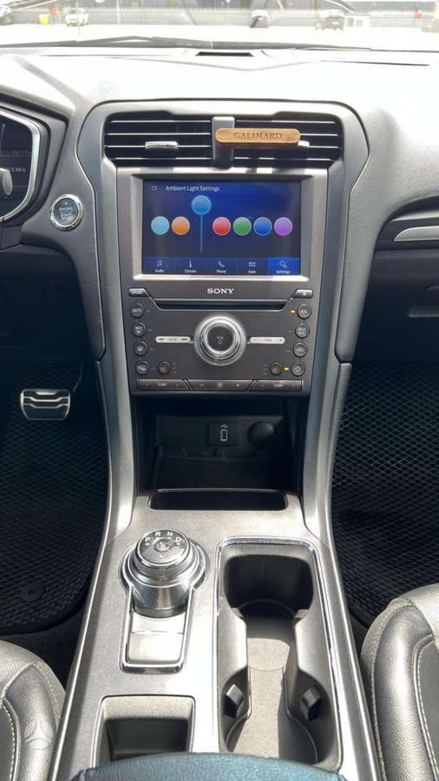 Black Ford Fusion 2017 in Vilnius, with an engine capacity of 2.00 L and mileage of 139 thousand km for 10500 €, photo 17 on AUTOMOTO.COM.LV