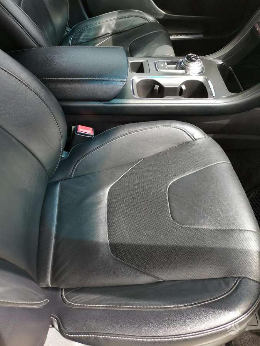 Black Ford Fusion 2017 in Vilnius, with an engine capacity of 2.00 L and mileage of 139 thousand km for 10500 €, photo 20 on AUTOMOTO.COM.LV